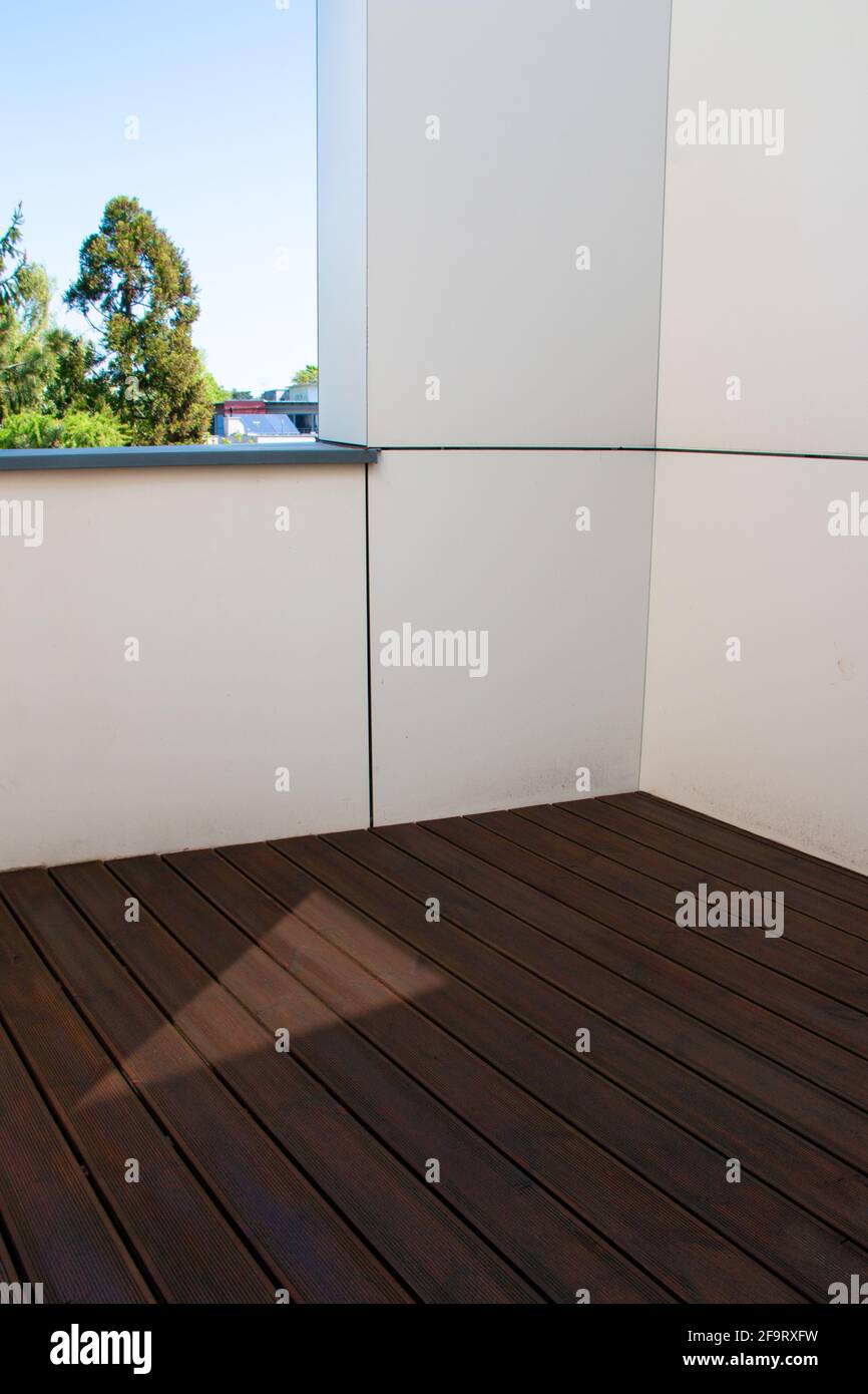 Pine wood deck on balcony, treated softwood decking terrace contrasting ...