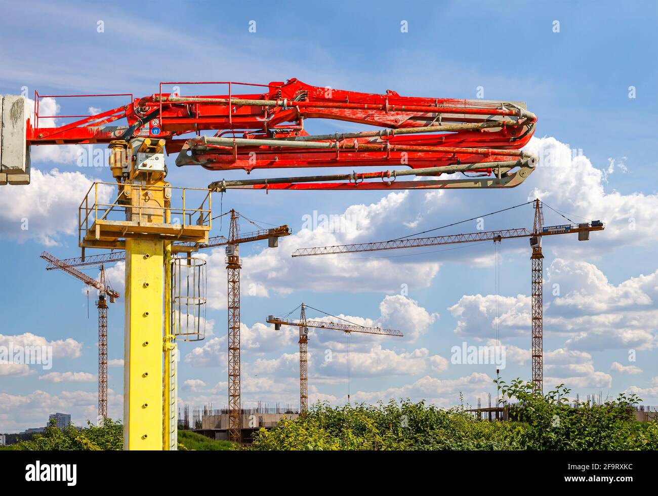 Construction concrete pump (pump truck) on the background construction ...