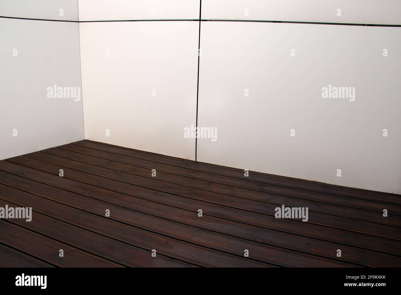 Pine wood deck, treated softwood decking terrace contrasting with white ...