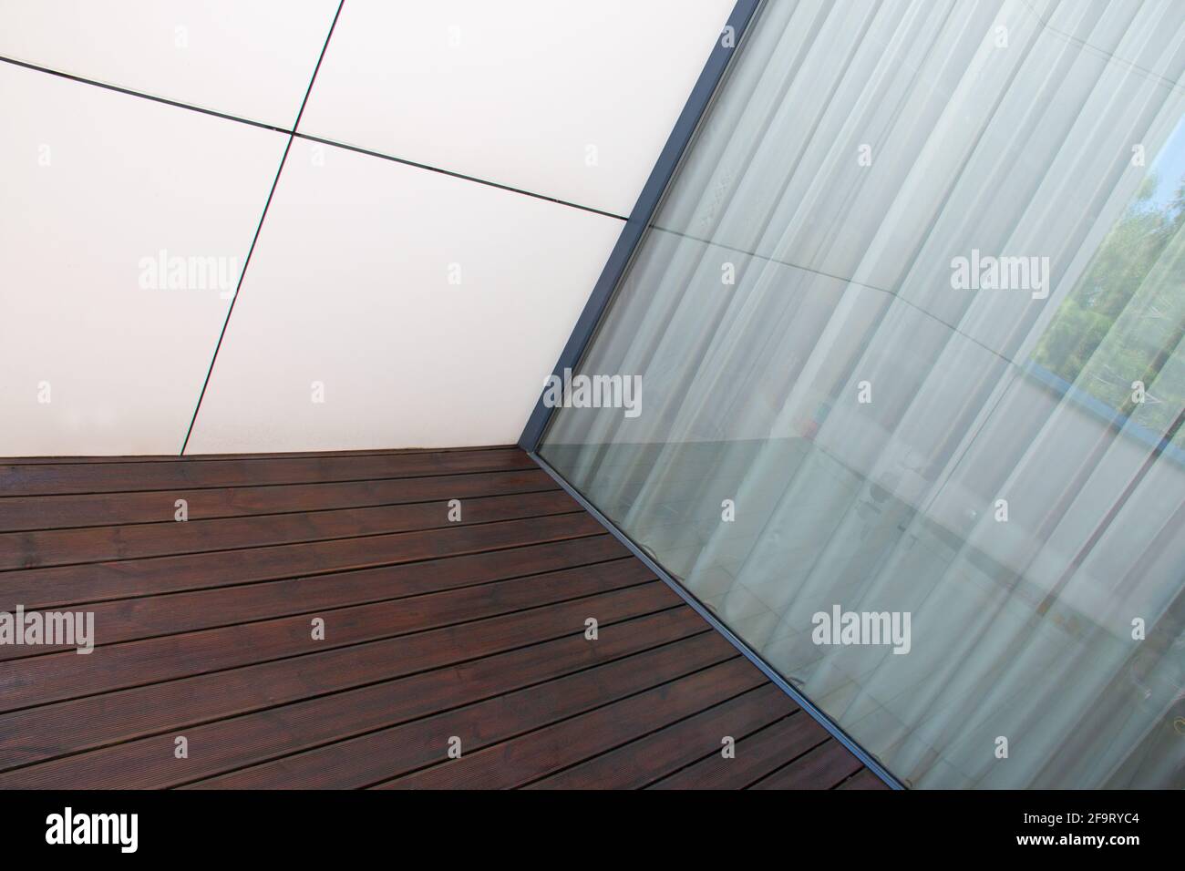 Pine wood deck, treated softwood decking terrace contrasting with white ...