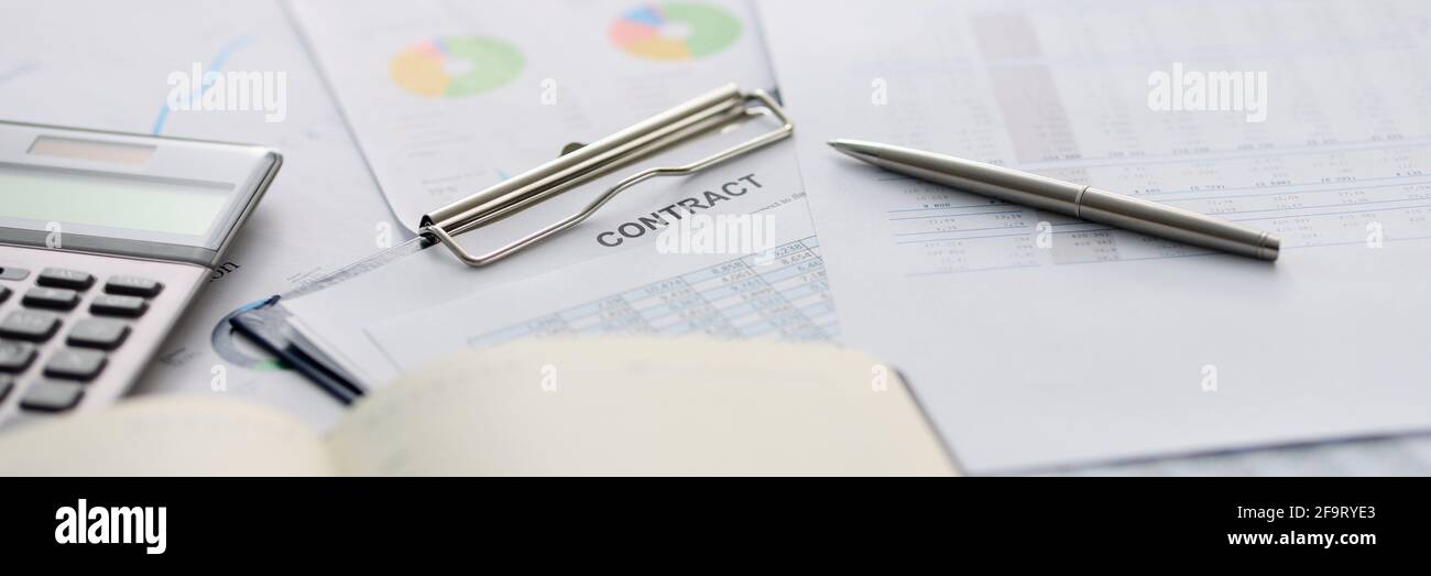 On table is contract pen and documents Stock Photo - Alamy