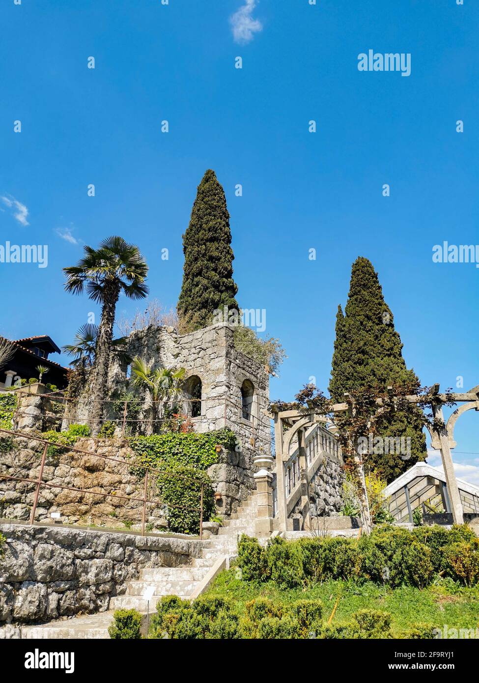 Stone structures and greenery in landscape gardens on sunny day in ...