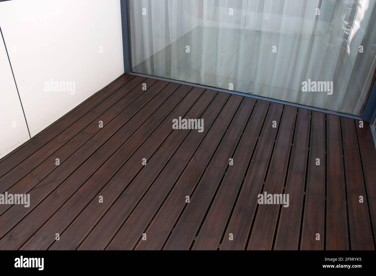 Pine wood deck and large glass window, treated softwood decking terrace ...