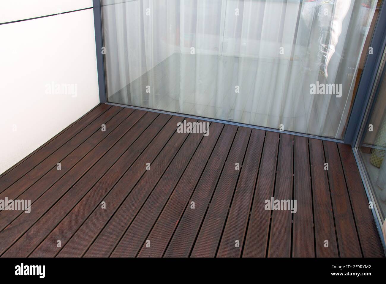Pine wood deck and large glass window, treated softwood decking terrace ...