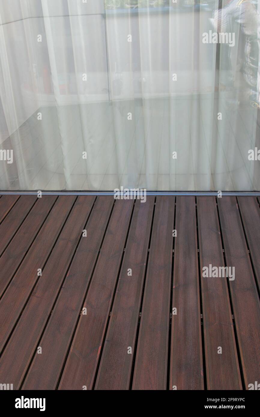 Pine wood deck and large glass window, treated softwood decking terrace ...