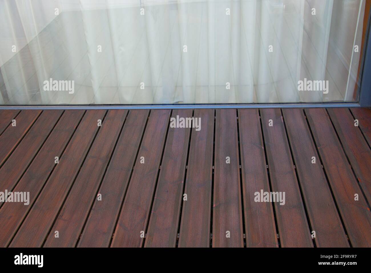 Pine wood deck and large glass window, treated softwood decking terrace ...