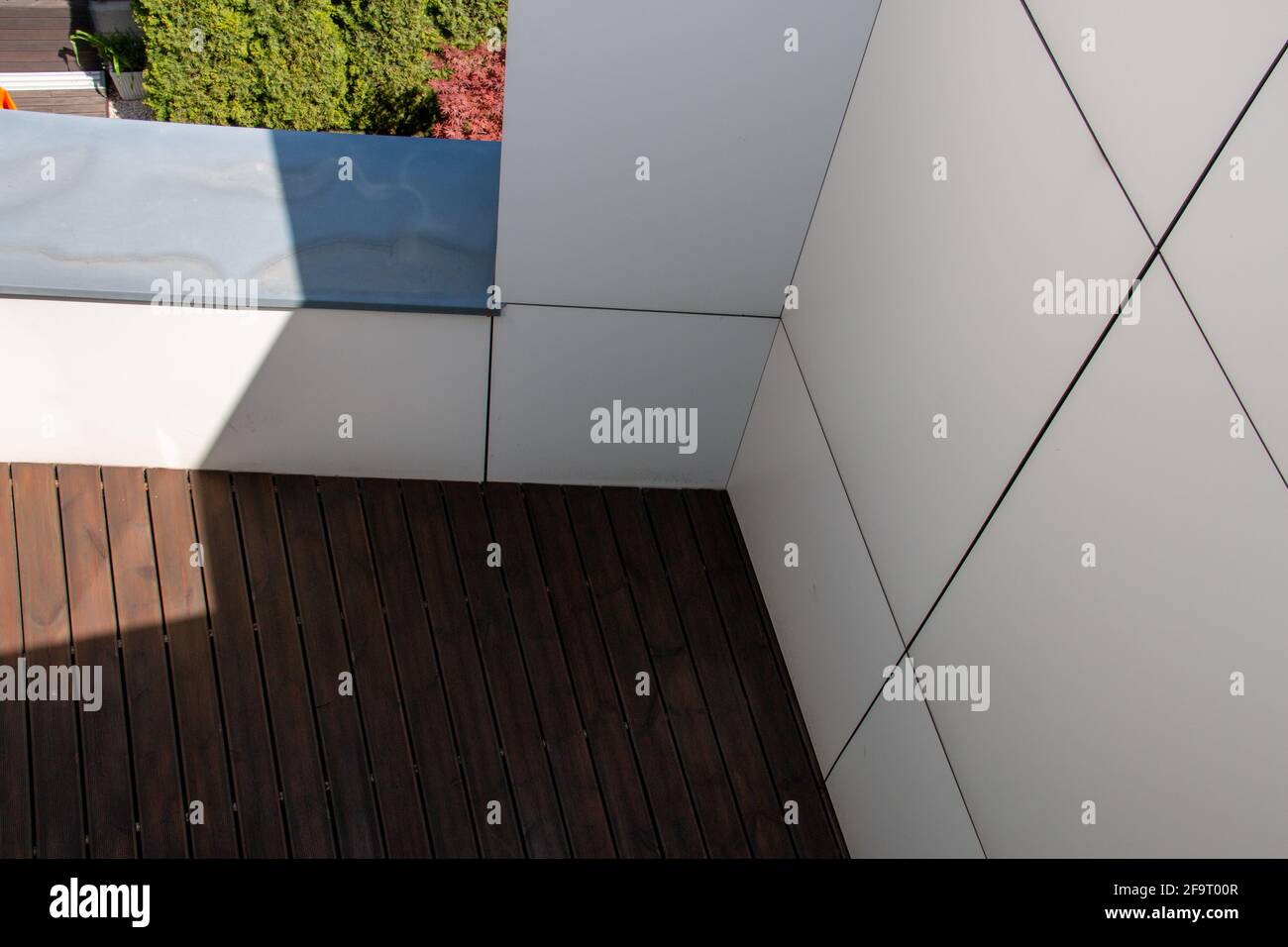 Pine wood deck on balcony, treated softwood decking terrace contrasting ...