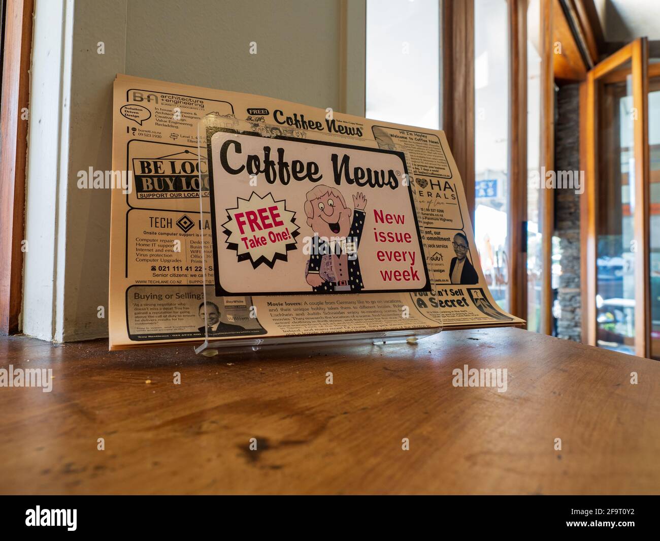 AUCKLAND, NEW ZEALAND - Apr 16, 2021: View of Coffee News advertising ...