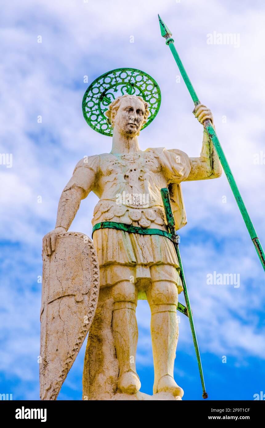 The sculpture of St. Theodore on the top of the west tower, Piazzetta ...