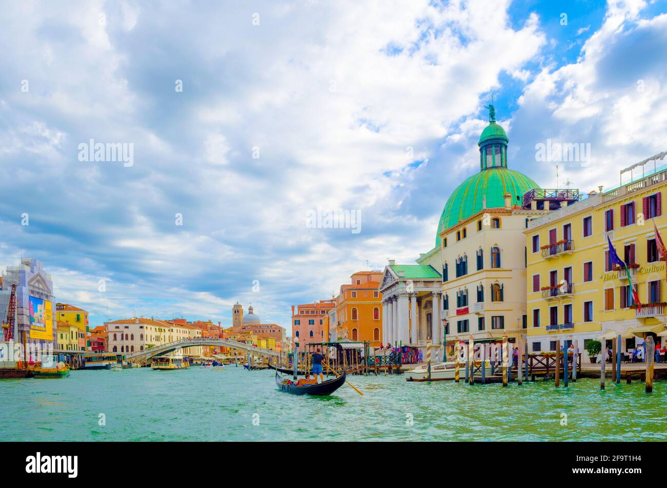 view of the grand canal in italian venice with a cupola of church of ...