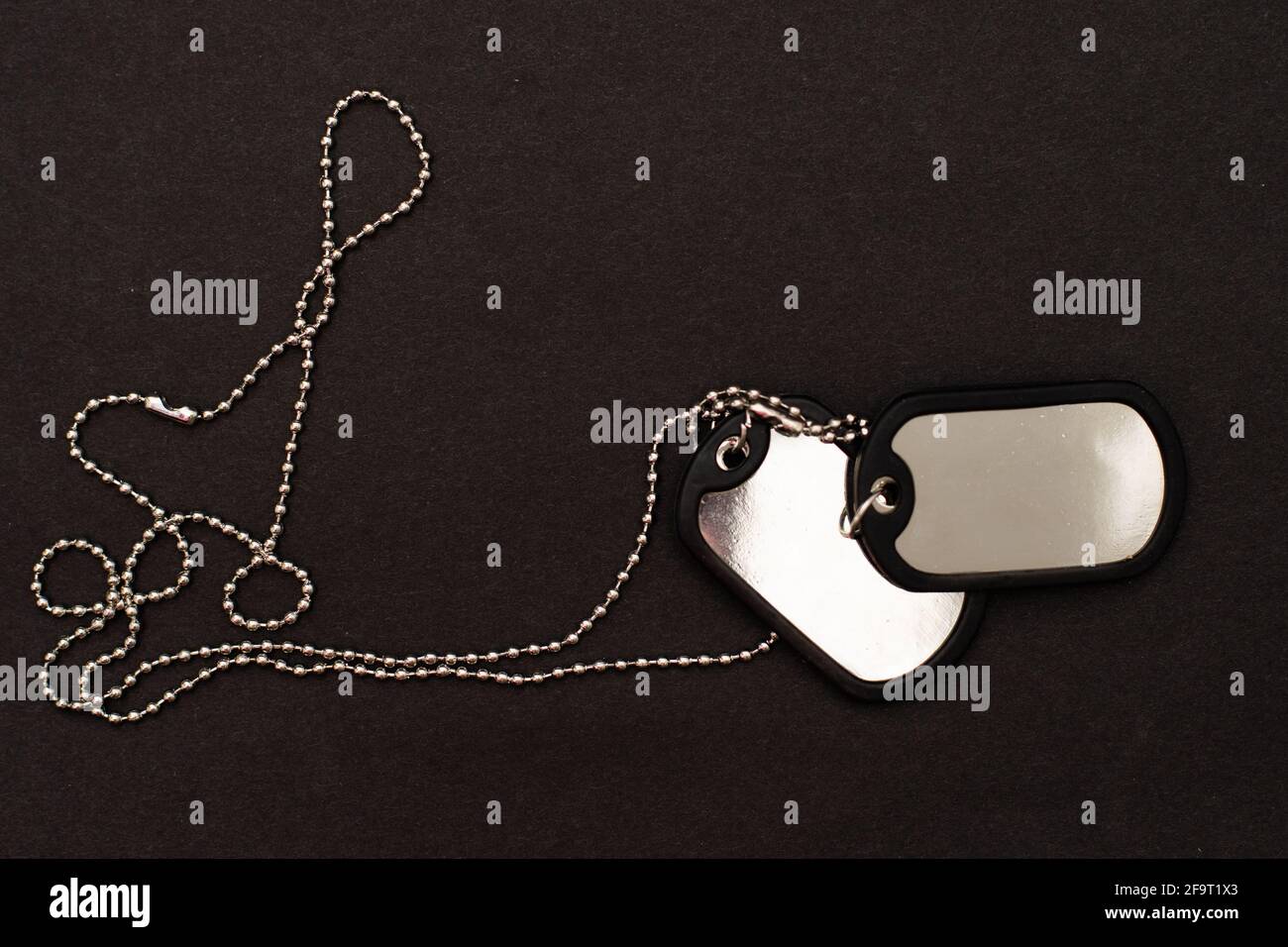 dog tag, army chains, army badge on the dark background Stock Photo - Alamy