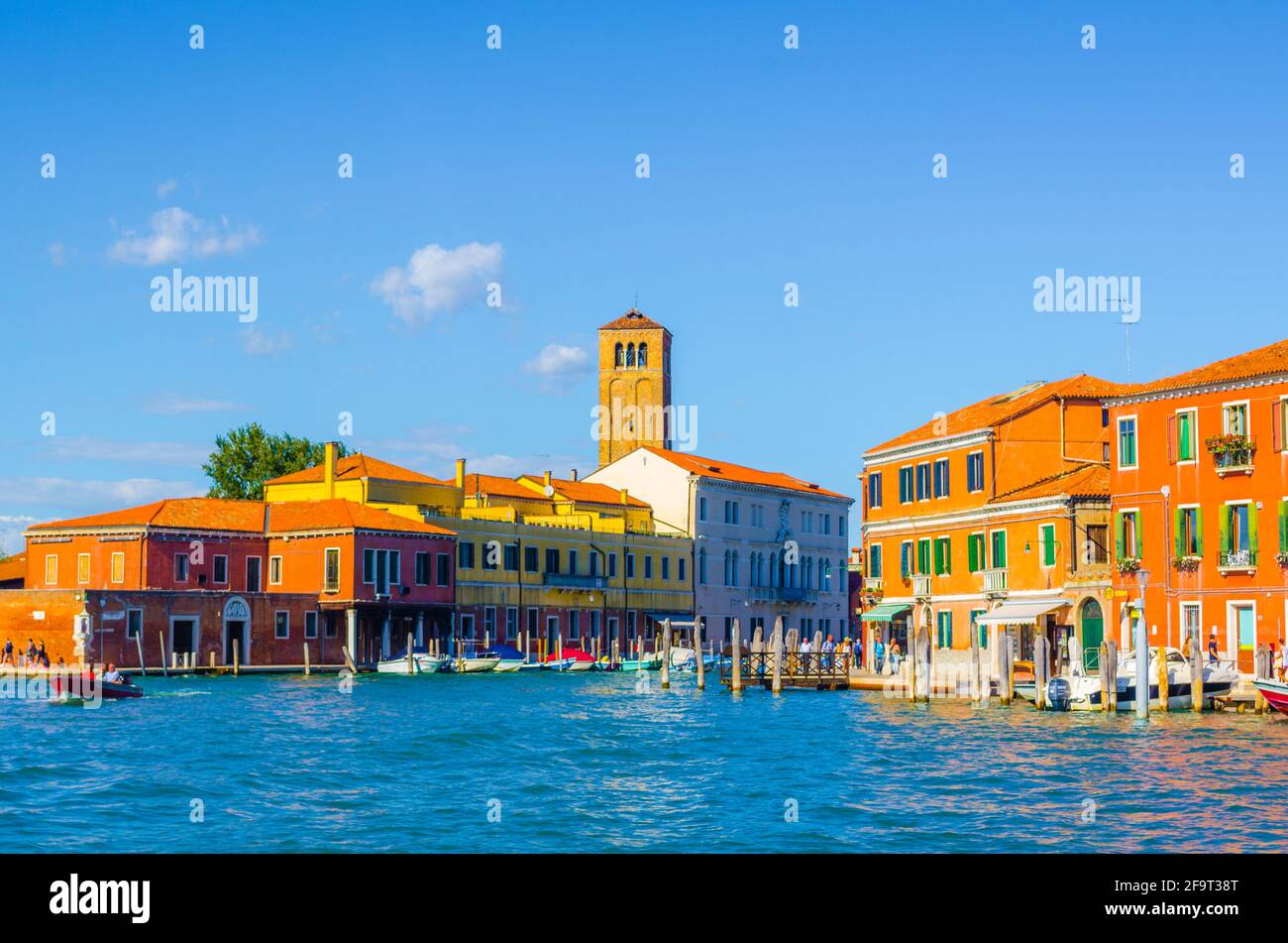 view of typical buildings of murano island near venice viewed from deck ...