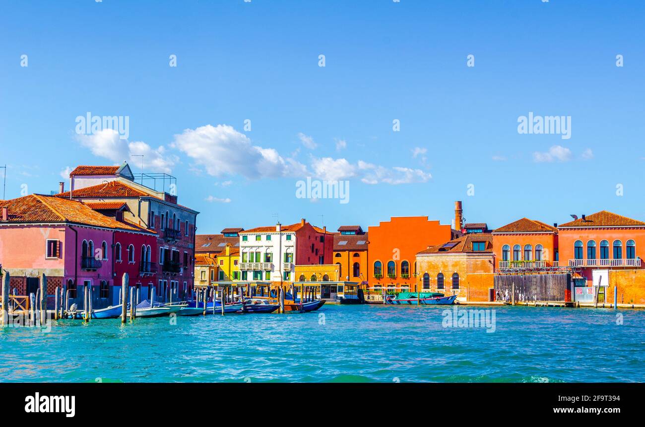 view of typical buildings of murano island near venice viewed from deck ...