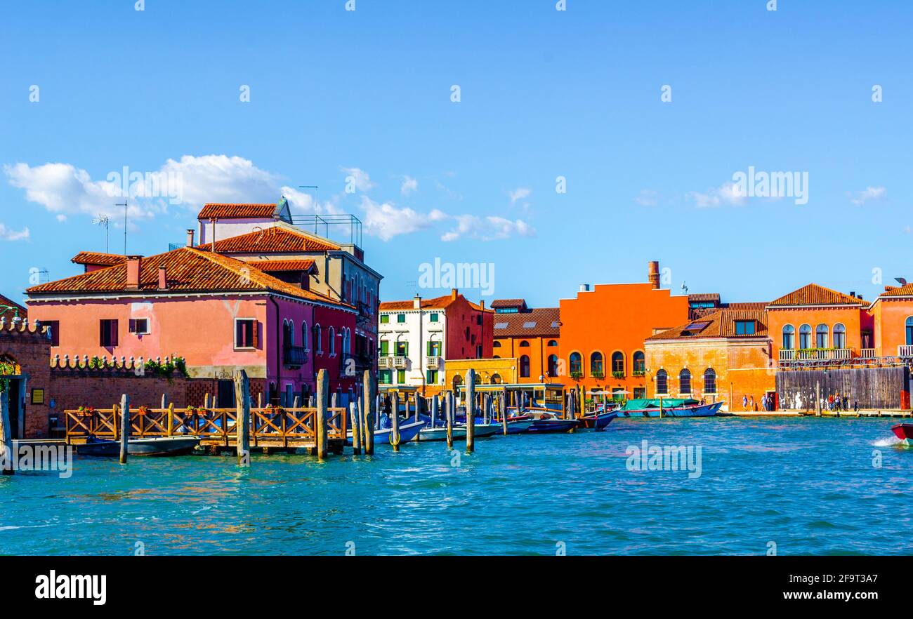 view of typical buildings of murano island near venice viewed from deck ...