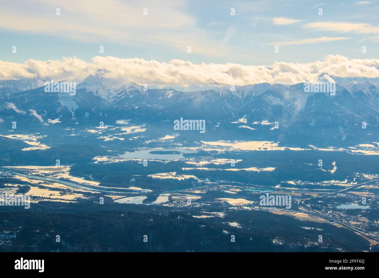 View of dolomites alps covered with snow from the gerlitzen mountain ...