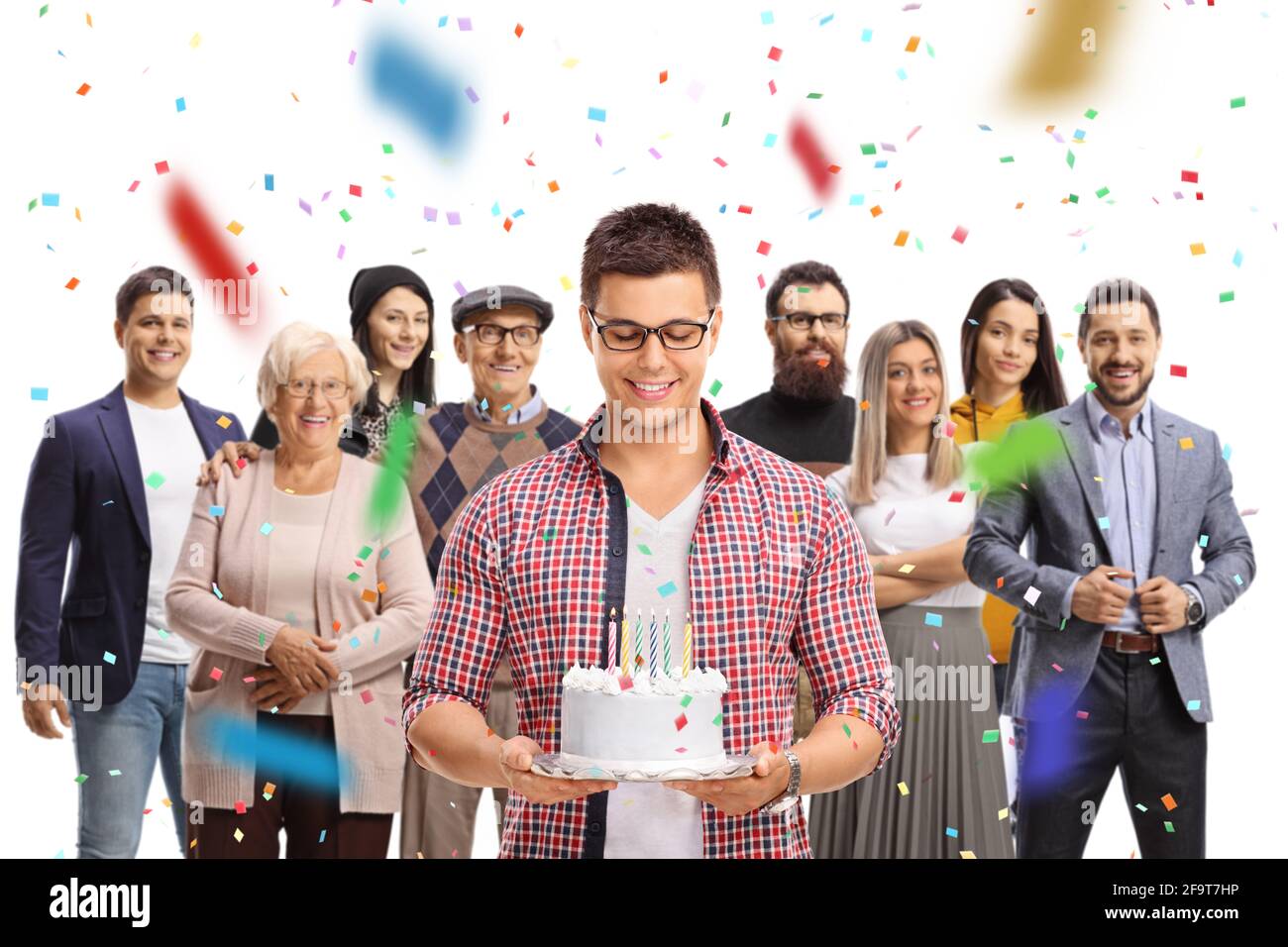 People celebrating birthday of a young man isolated on white background ...