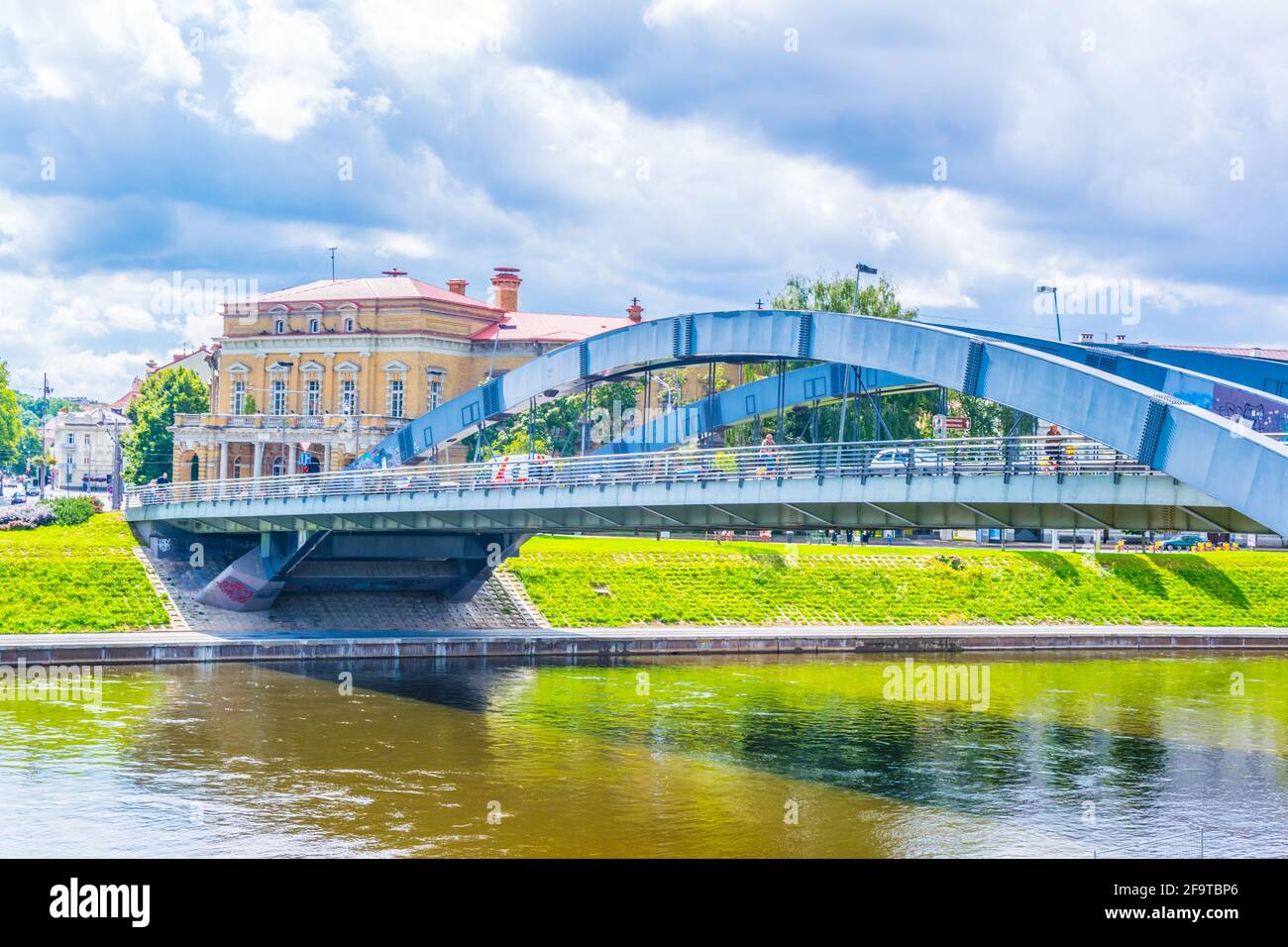 Steel bridge over river Neris and The Wroblewski Library of the ...