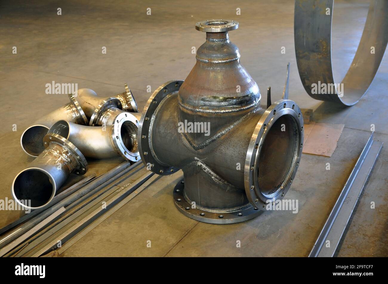 Making a pipe connection with branches. Pipeline Stock Photo - Alamy