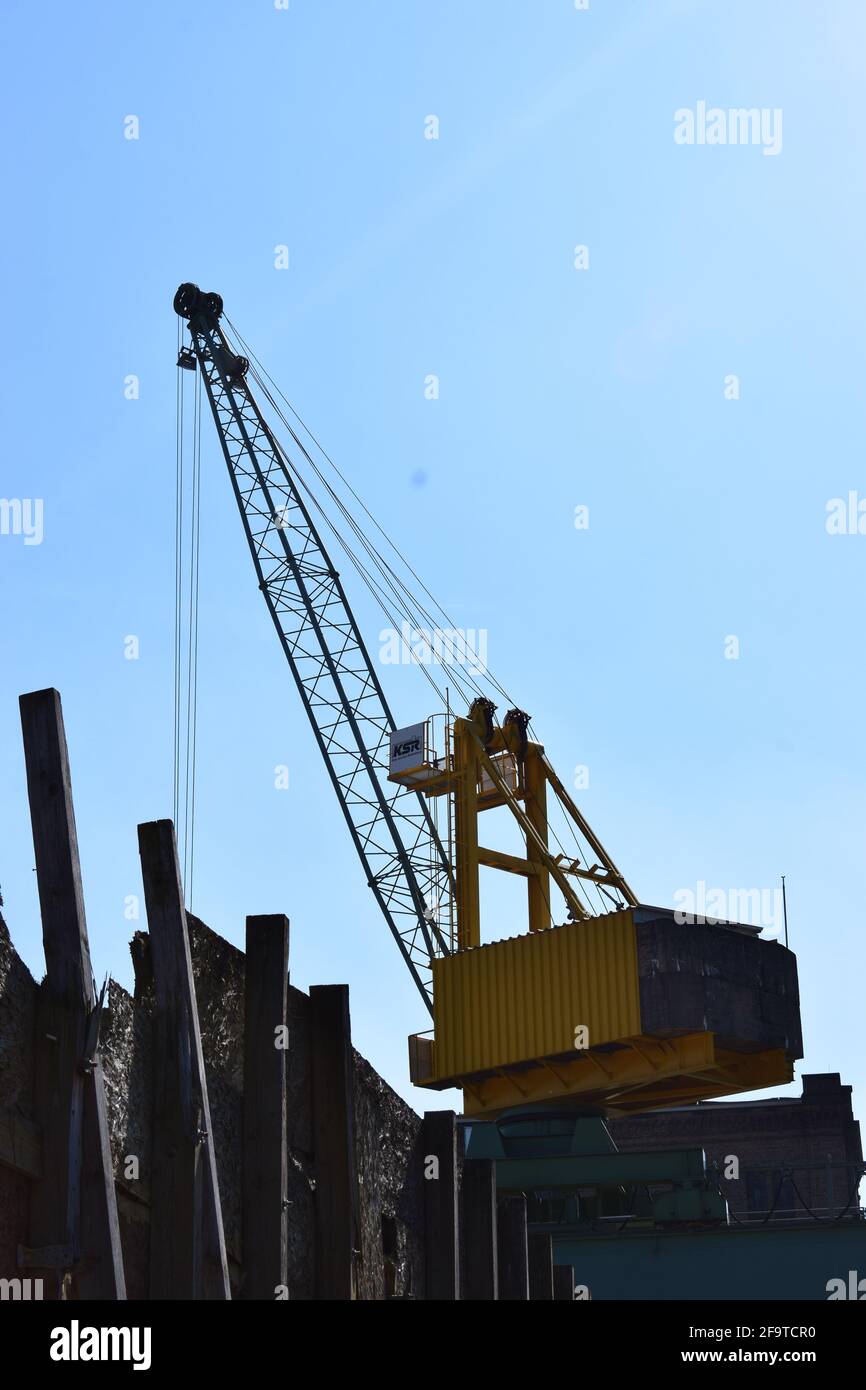crane at an old factory Stock Photo - Alamy