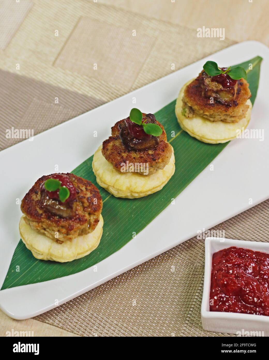 indian mutton kebab with puff pastry, foie gras and strawberry sauce ...