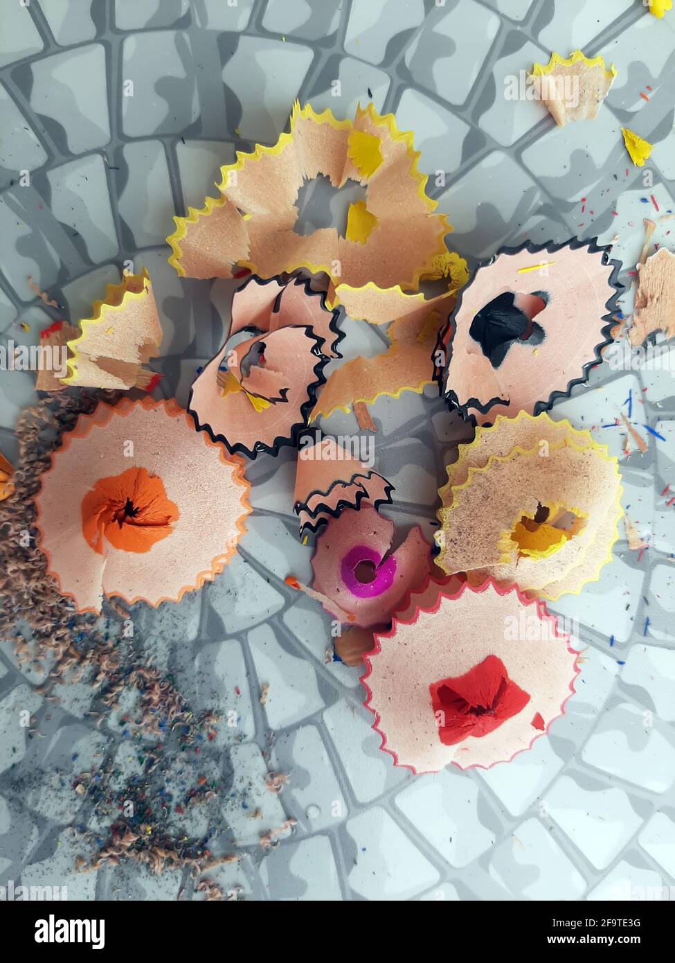 Colorful graphite pencils saw dust. Sharpening crayons Stock Photo - Alamy