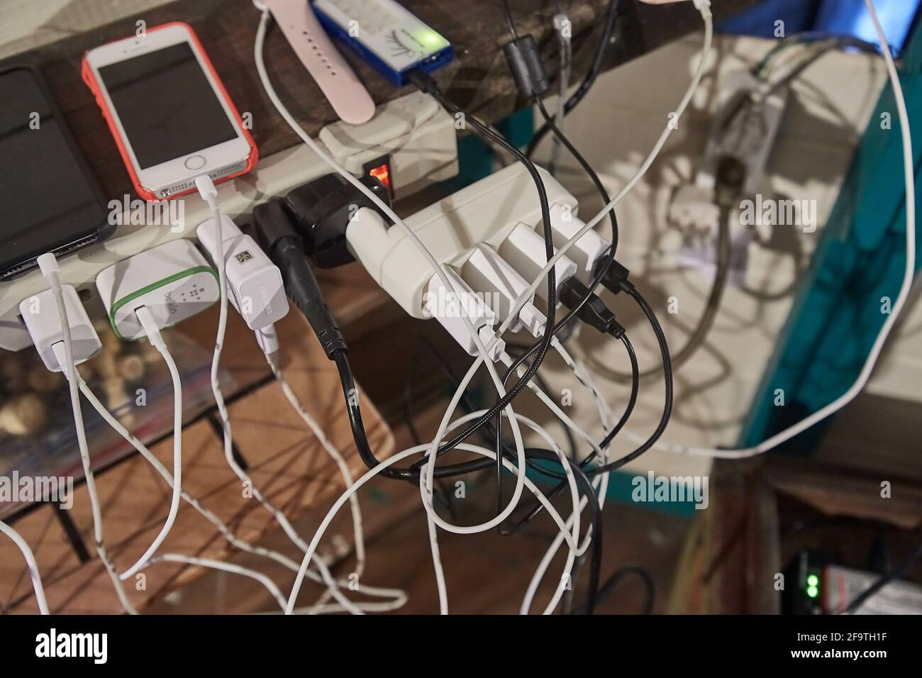 Battery charger wires mess in hi-res stock photography and images - Alamy