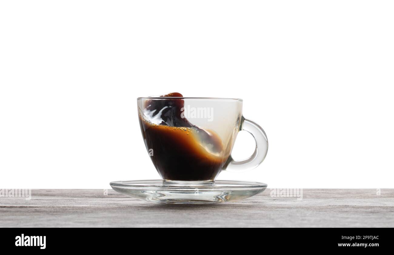 Cup of splashing coffee isolated on white Stock Photo - Alamy