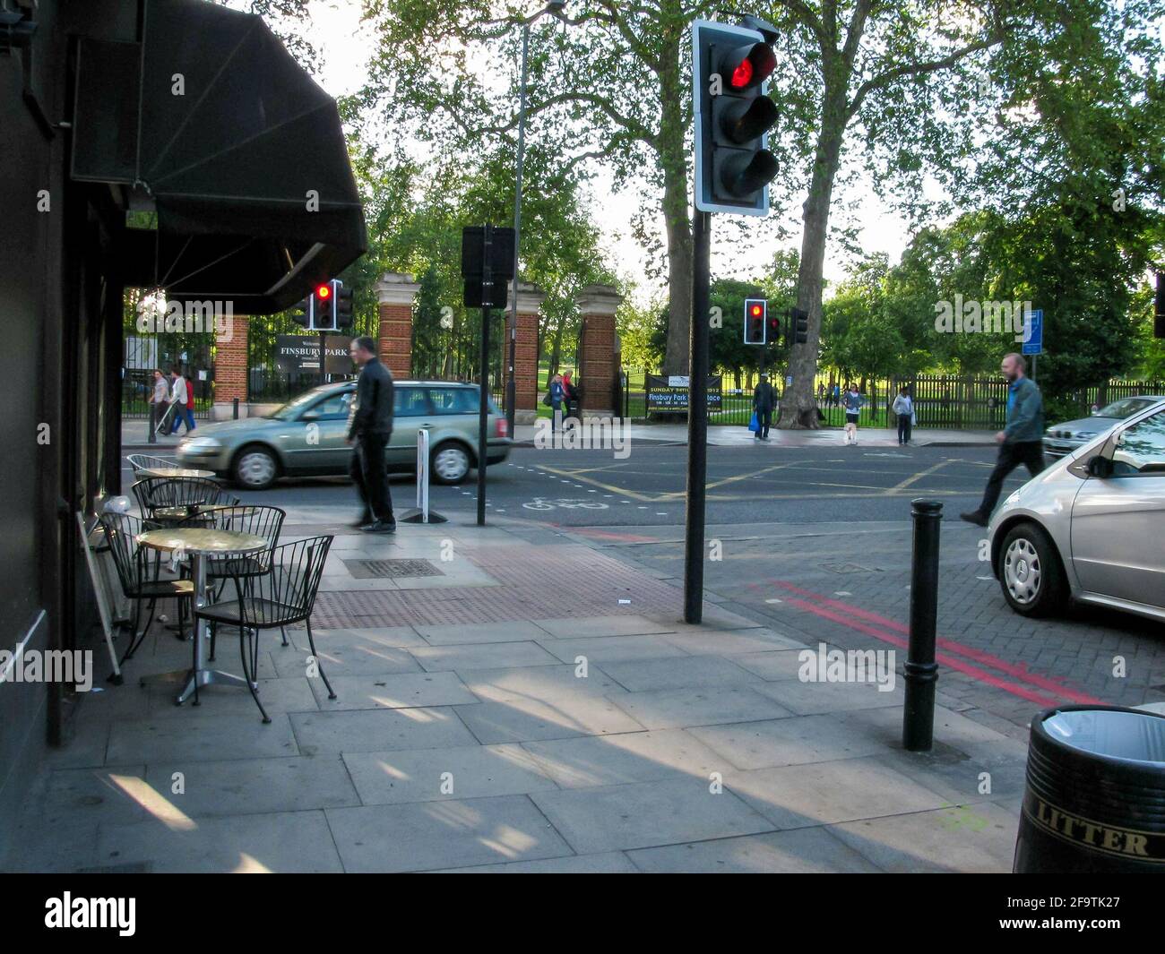 North London streets intersection, people and traffic lights at the ...