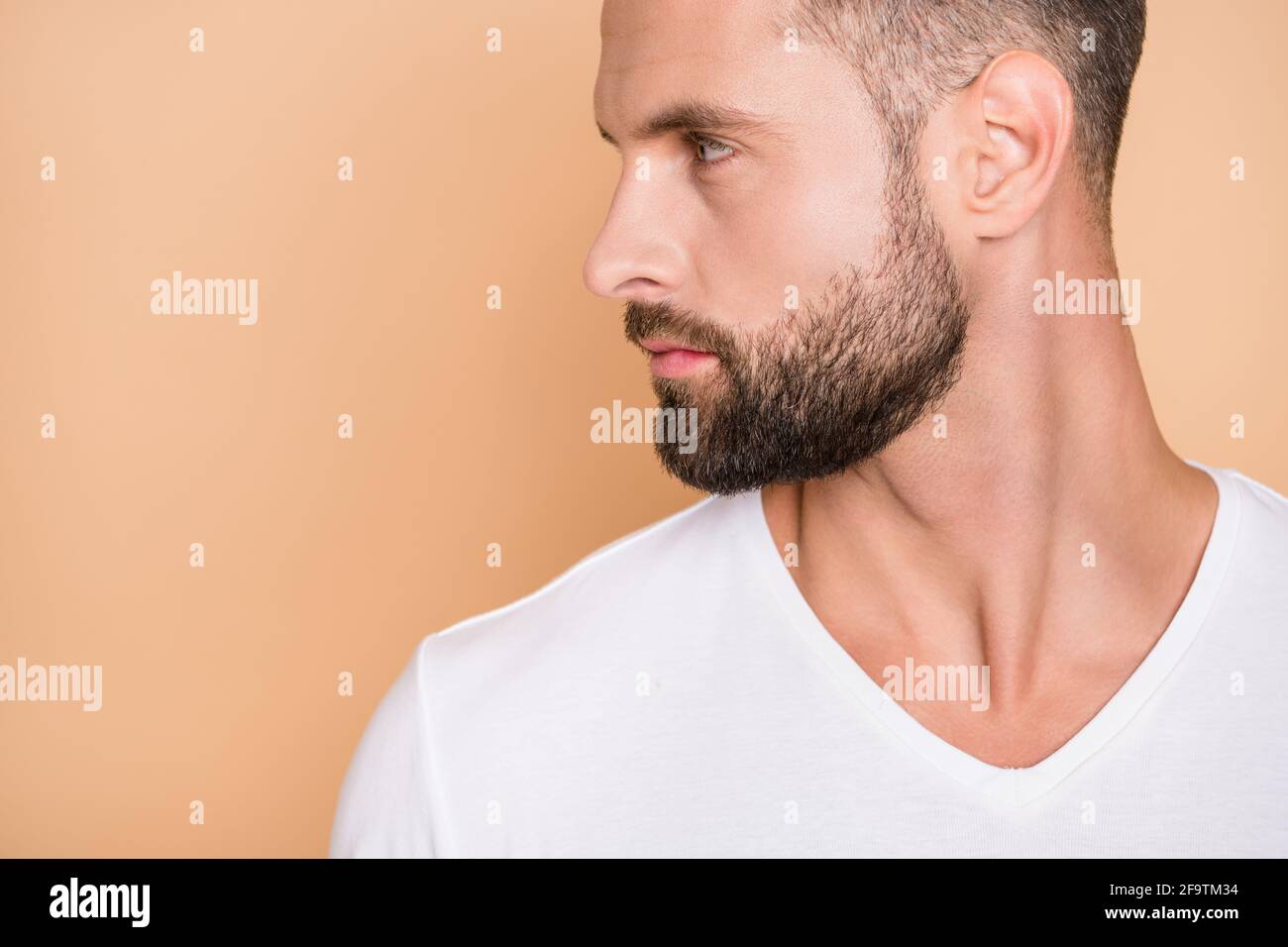 Cropped profile side photo of young handsome stubble man serious look ...