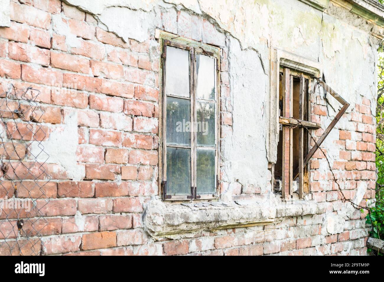 The windows of abandoned dilapidated house Stock Photo - Alamy