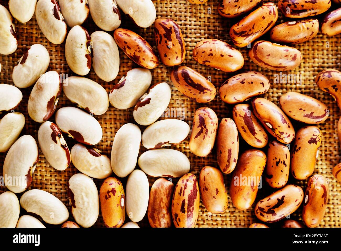 Heap of white beans and kidney beans on brown background ,creamy white ...
