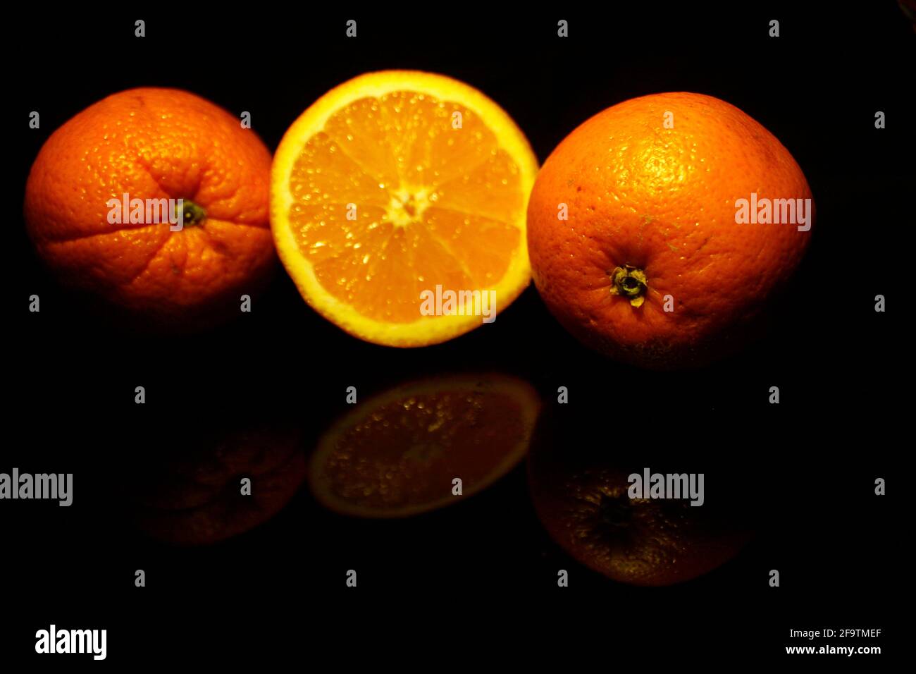 One half juicy orange hi-res stock photography and images - Alamy