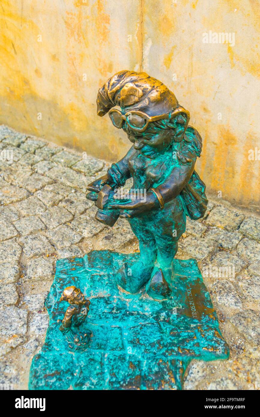 Statue of a dwarf with a camera, Wroclaw, Poland Stock Photo - Alamy