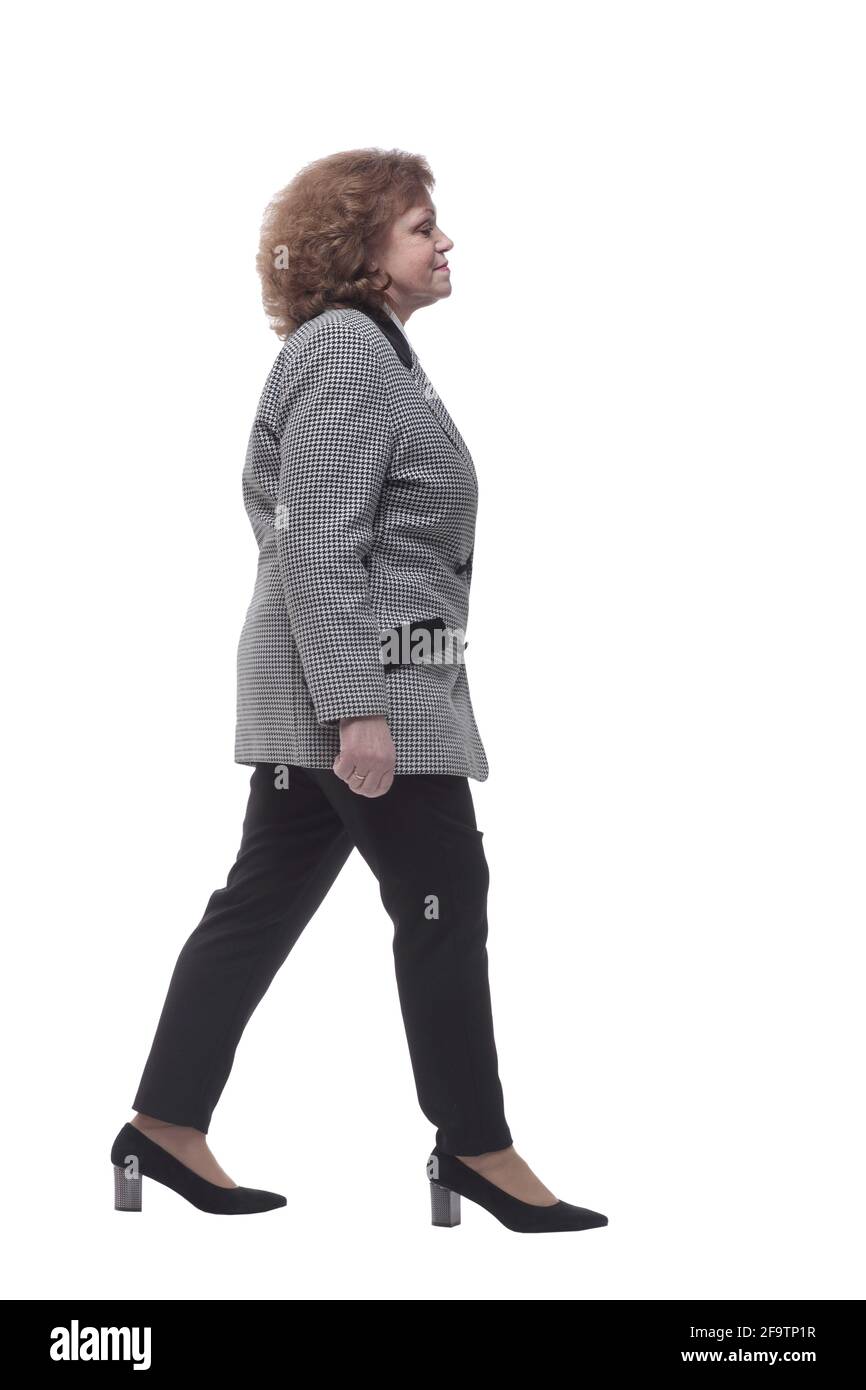 in full growth. confident mature woman stepping forward Stock Photo - Alamy