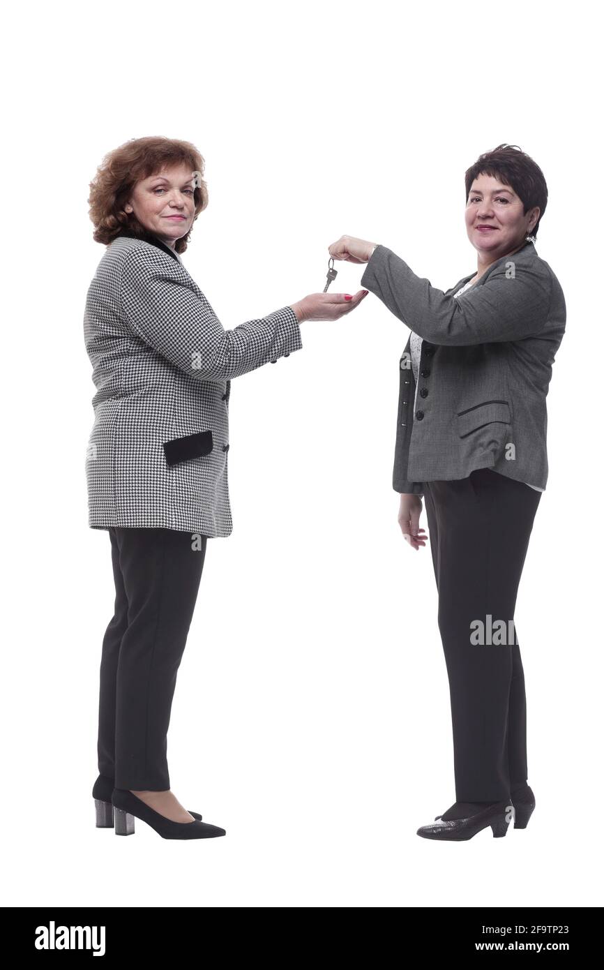 in full growth. real estate agent handing keys to his client Stock ...