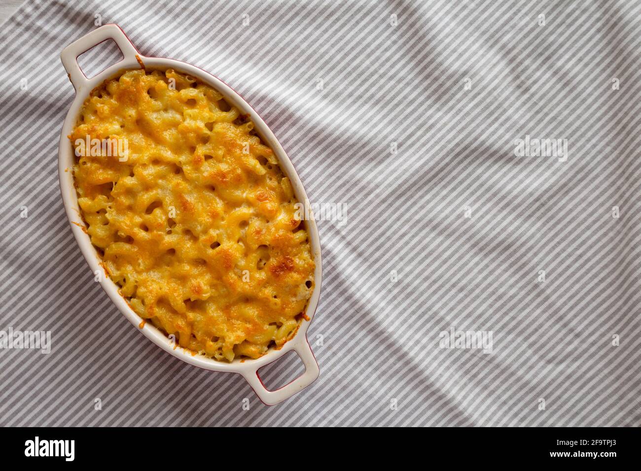 Homemade Macaroni and Cheese Pasta on cloth, top view. Flat lay ...