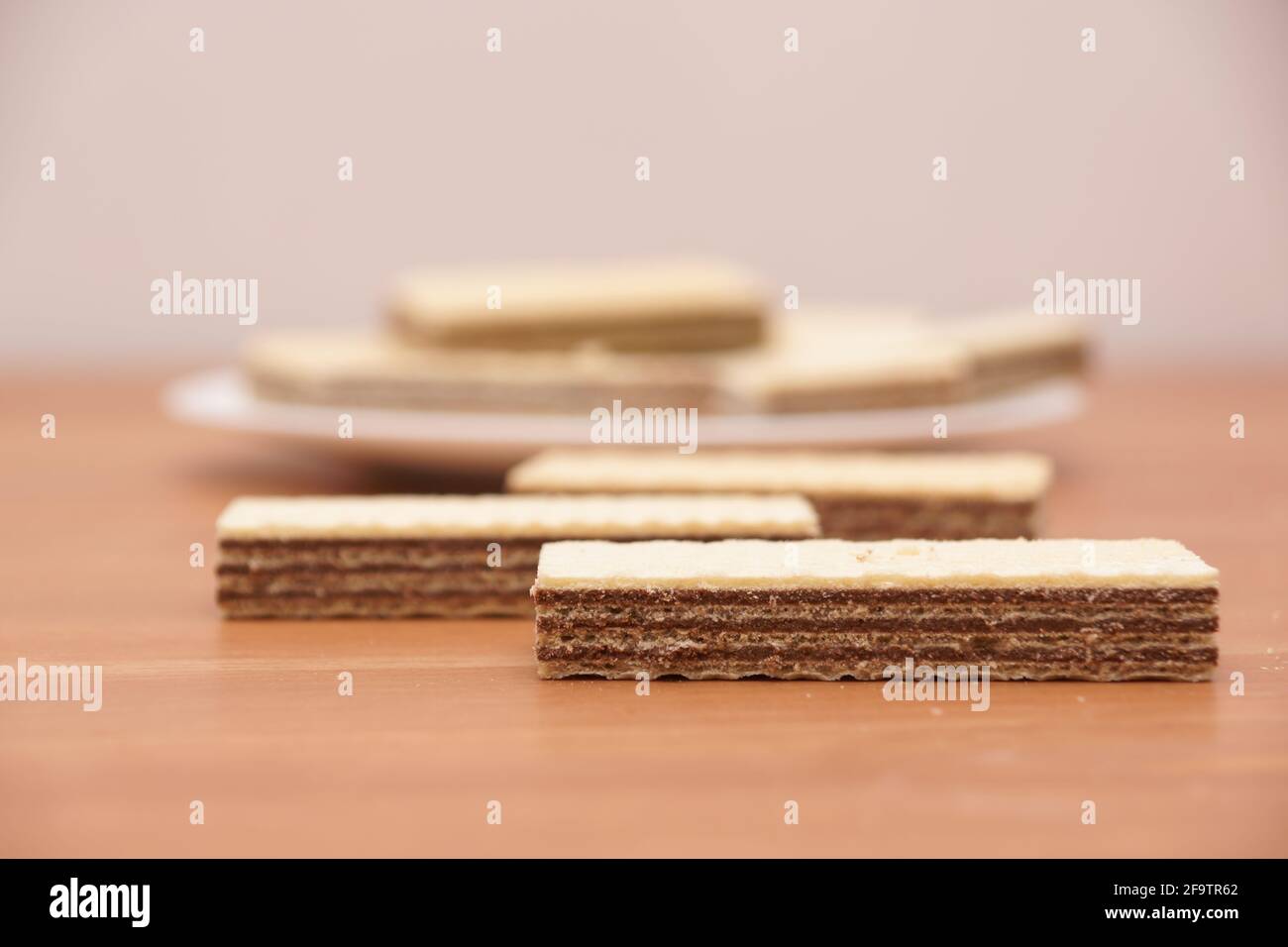 Chocolate wafers on table Stock Photo - Alamy