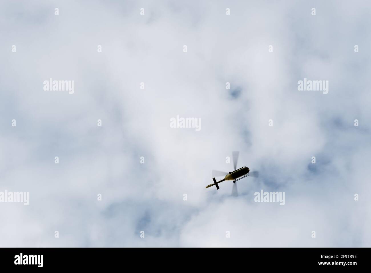 Low angle shot helicopter flying hi-res stock photography and images ...