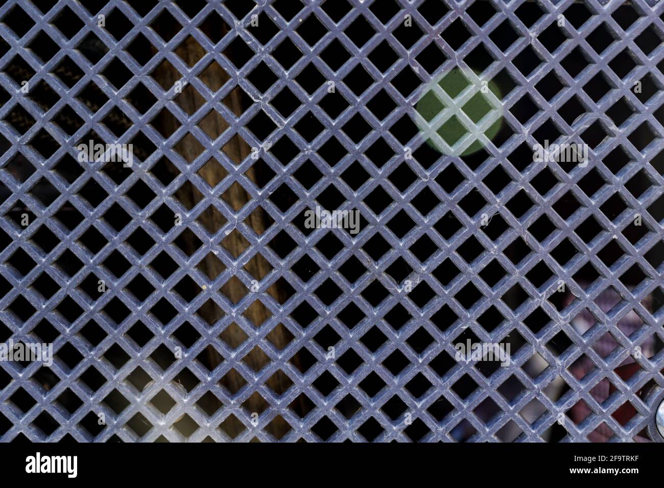 Metal mesh fence perfect for texture and background Stock Photo - Alamy