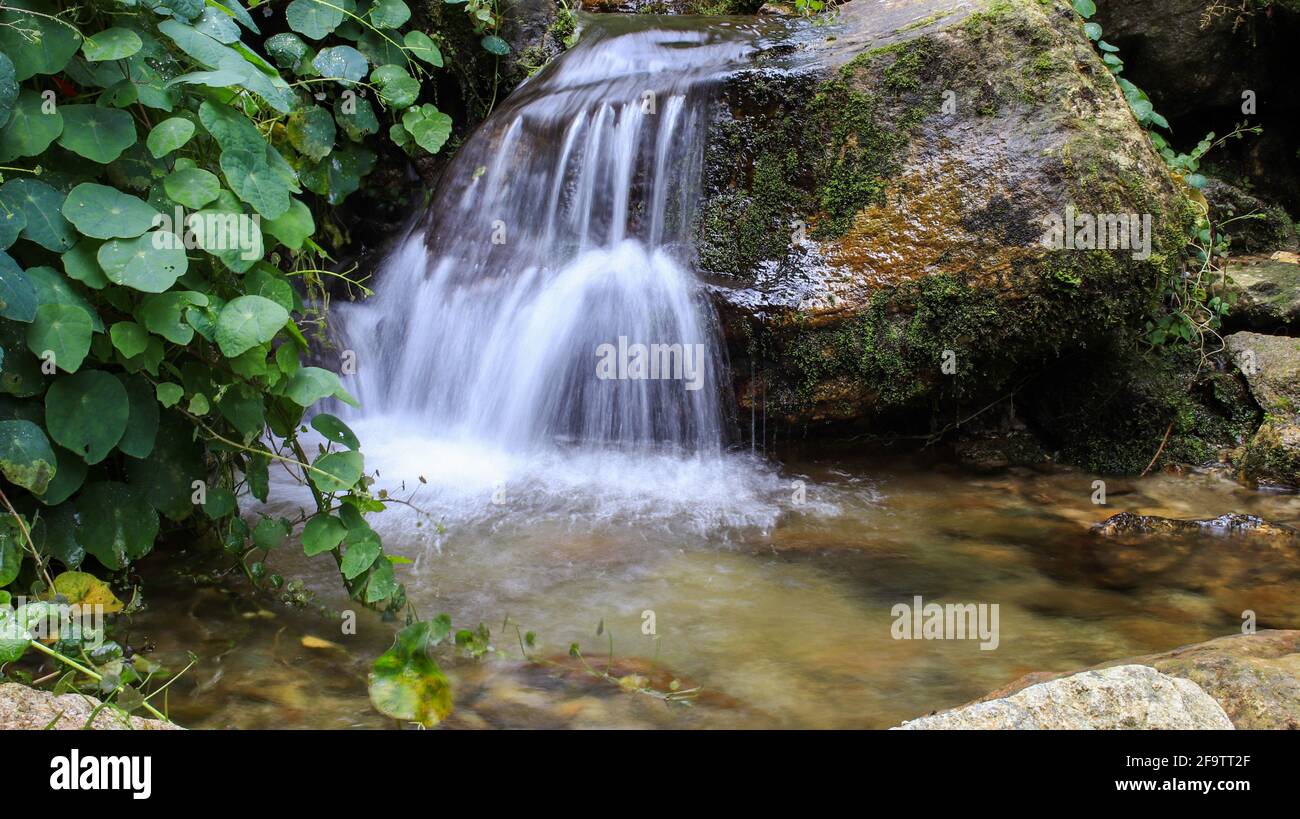 Small waterfall in nature Stock Photo - Alamy