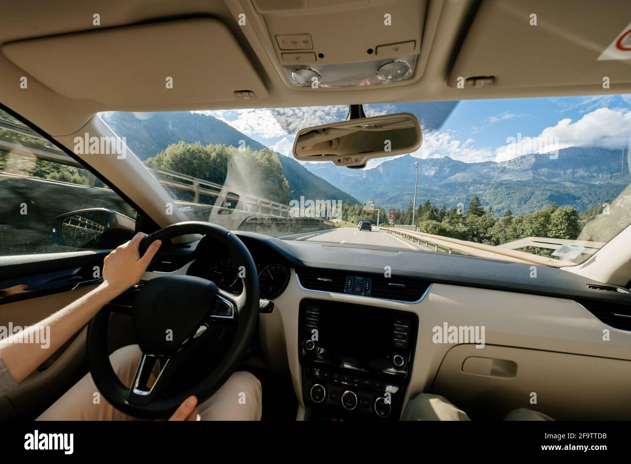 Woman driving her new car with destination Servoz Stock Photo - Alamy