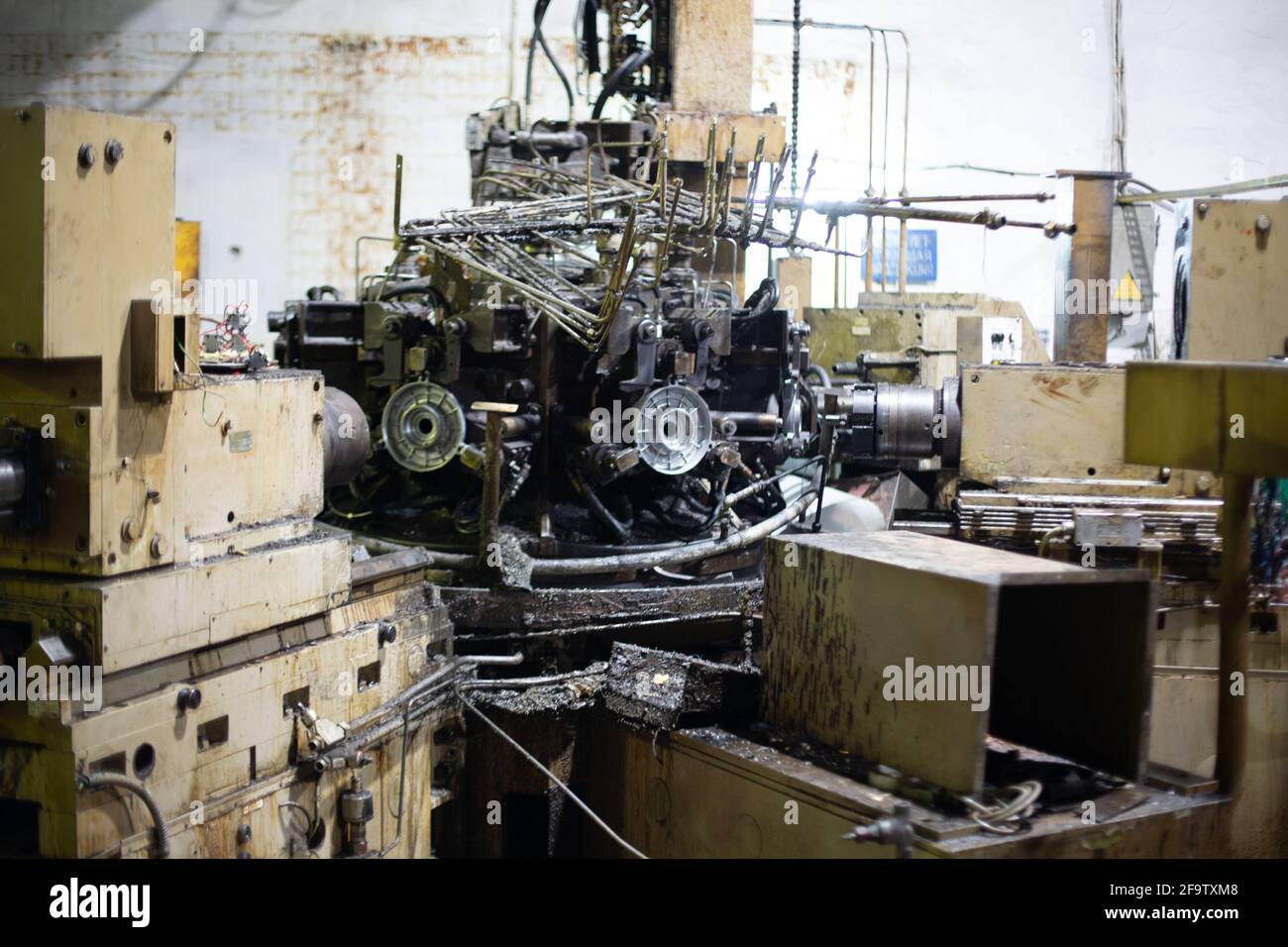 Dirty old industrial equipment with oil stains, symbol of obsolete ...