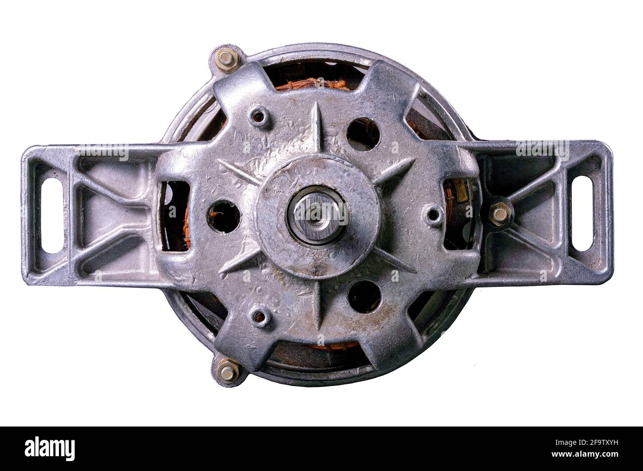 The electric motor from the washing machine. Spare parts used to repair ...