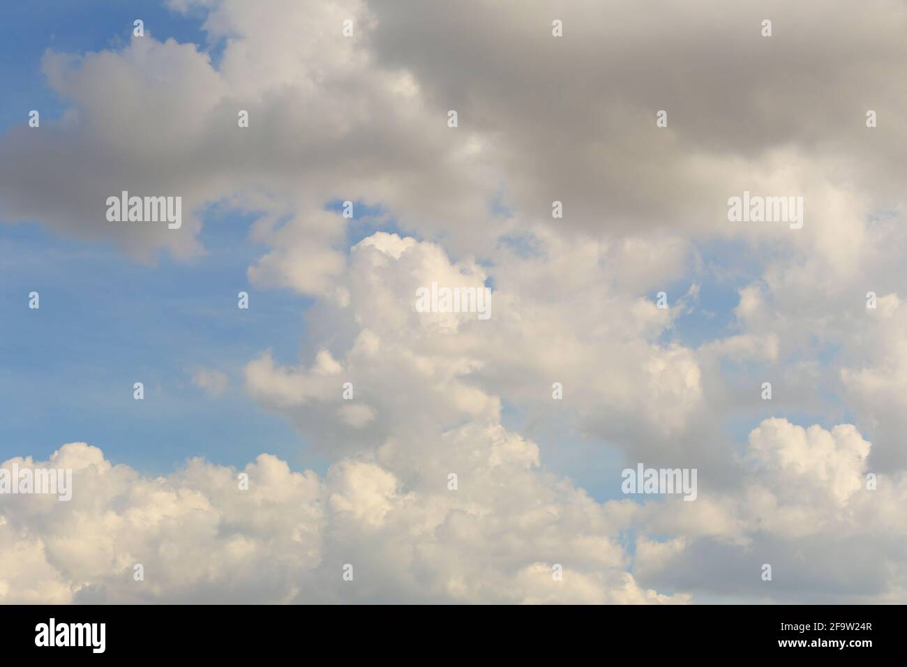 Blue sky with white clouds in the daytime background for design in you ...