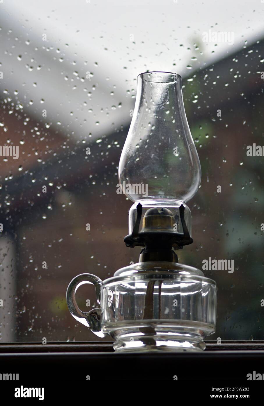 empty glass vintage oil lamp Stock Photo - Alamy