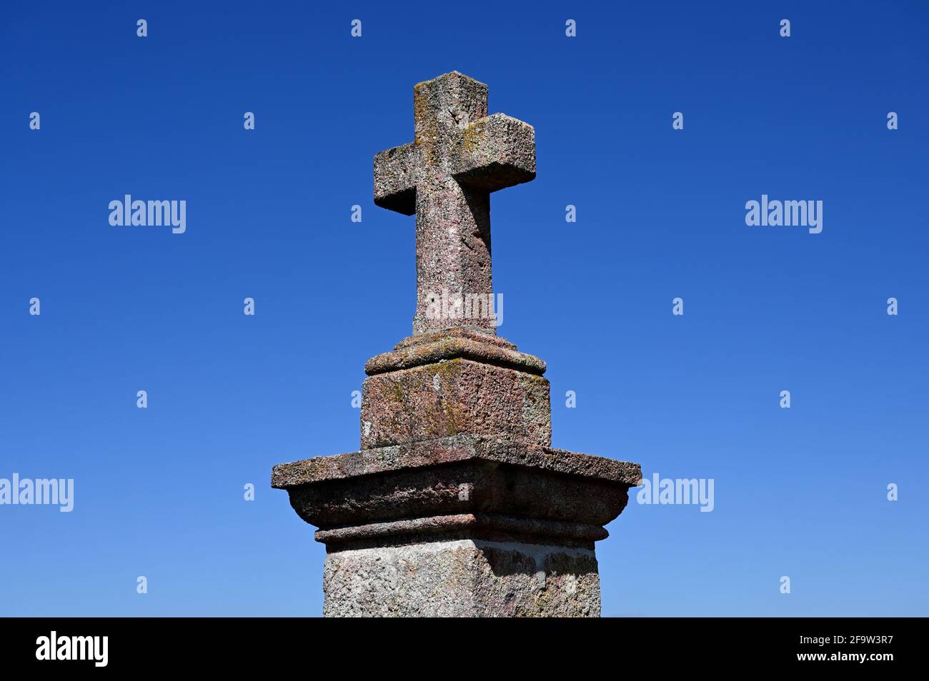 A sandstone christian cross in french countryside Stock Photo - Alamy