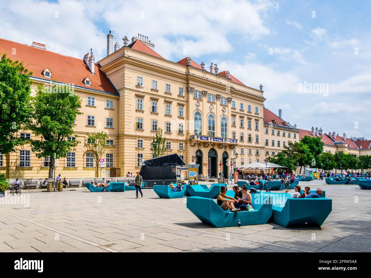 VIENNA, AUSTRIA, JUNE, 2016: Young people are chilling out on benches ...