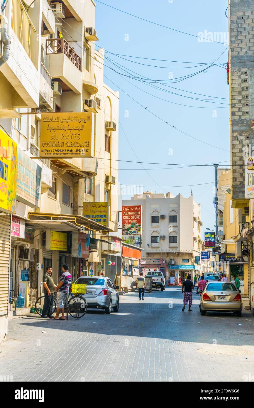 AL MUHARRAQ, BAHRAIN, OCTOBER 23, 2016: View of a shopping street on ...