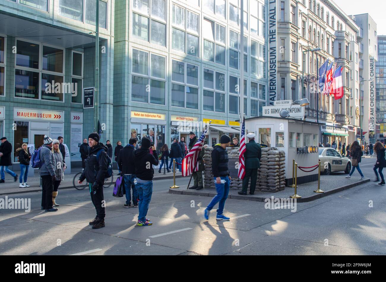 BERLIN, GERMANY, MARCH 12, 2015: people are admiring famous checkpoint ...