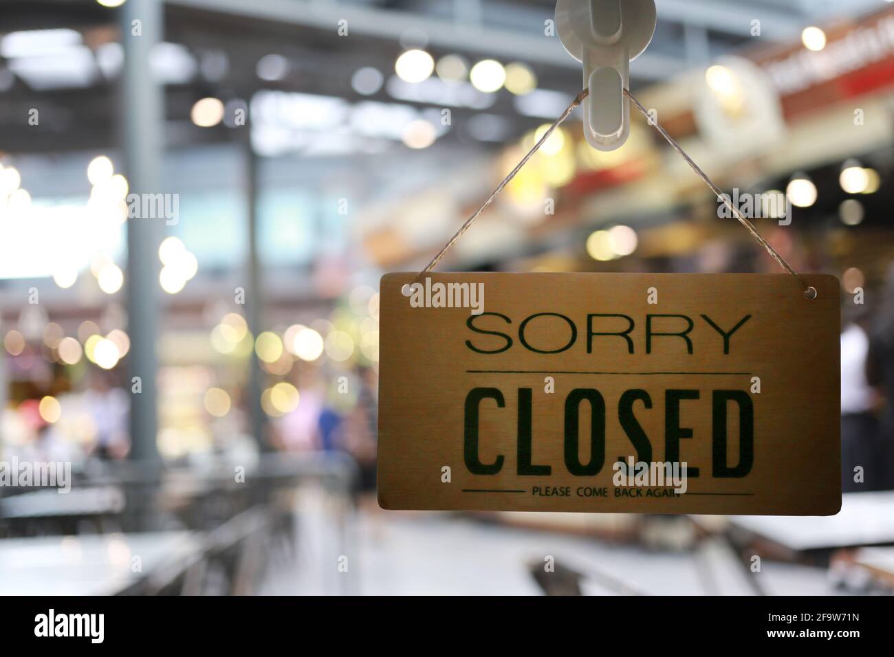 Shop closed of storefront sign,restaurant shows the closing status ...